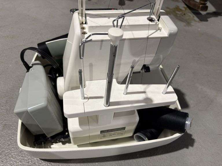 Surger sewing machine - Bonnigson & Associates