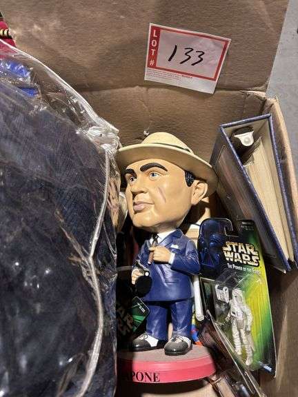 Al Capone statue, Star Wars figurines, sweater - Bonnigson & Associates