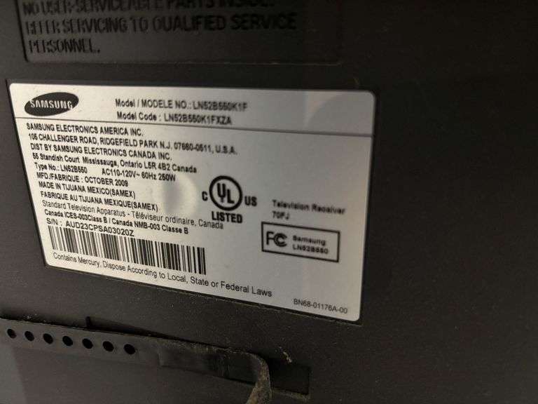 52 inch Samsung TV on entertainment stand - Bonnigson & Associates