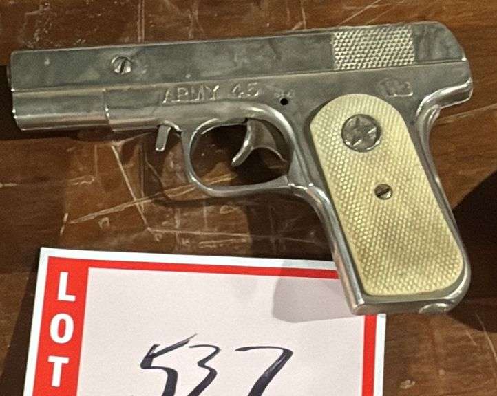 Army 45 toy pistol - Bonnigson & Associates
