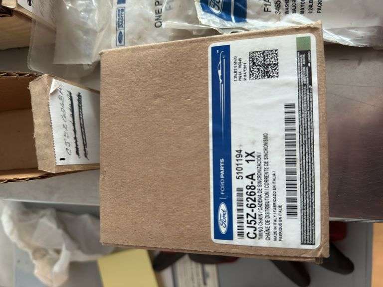 63 Ford parts in inventory holders labeled on the front with the part ...