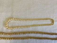 4 ivory like necklaces - Brian Burke Auctions