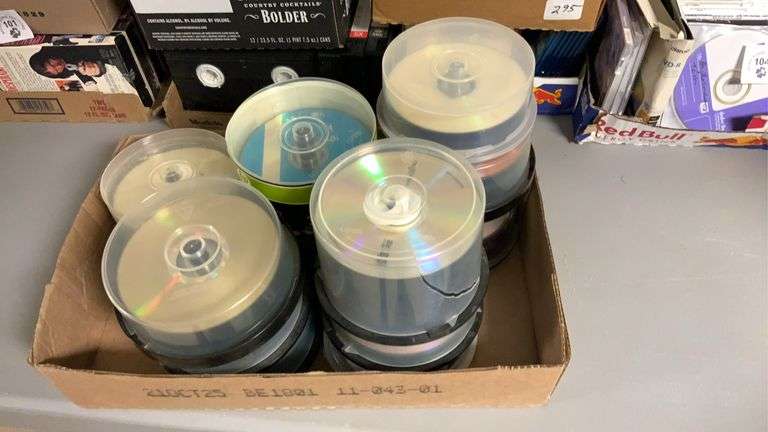 (12) Stacks of Recordable CDs and DVDs - Brian Burke Auctions