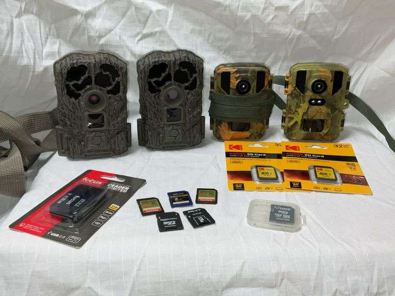 Four Trail cameras two by stealth cam model STC – BT18A, and 2 mini 800 ...
