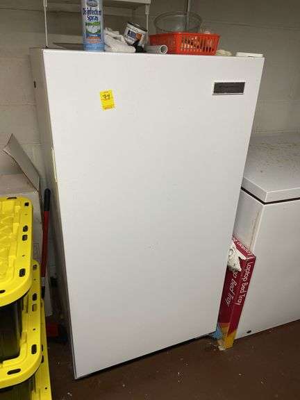 Frigidaire smaller upright freezer working blowing ice cold. Basement ...