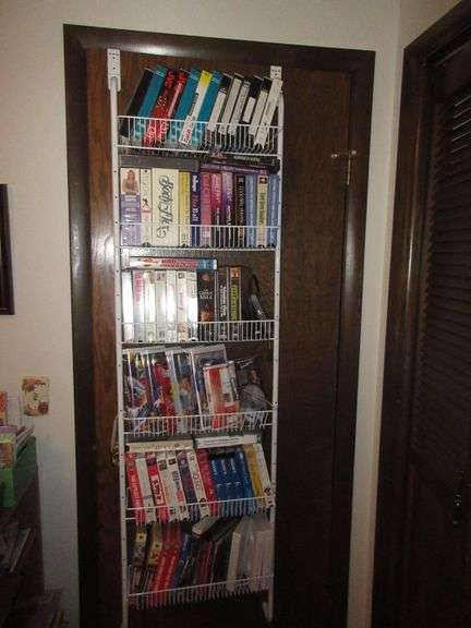 Door Shelf With Various VHS Movies - Prime Time Auctions, Inc.