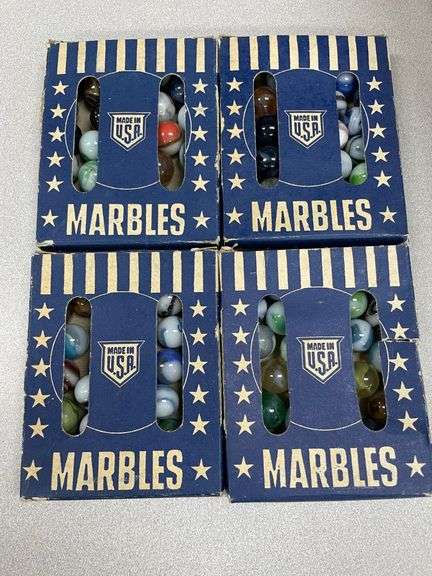 4) Boxes of Marbles - Prime Time Auctions, Inc.