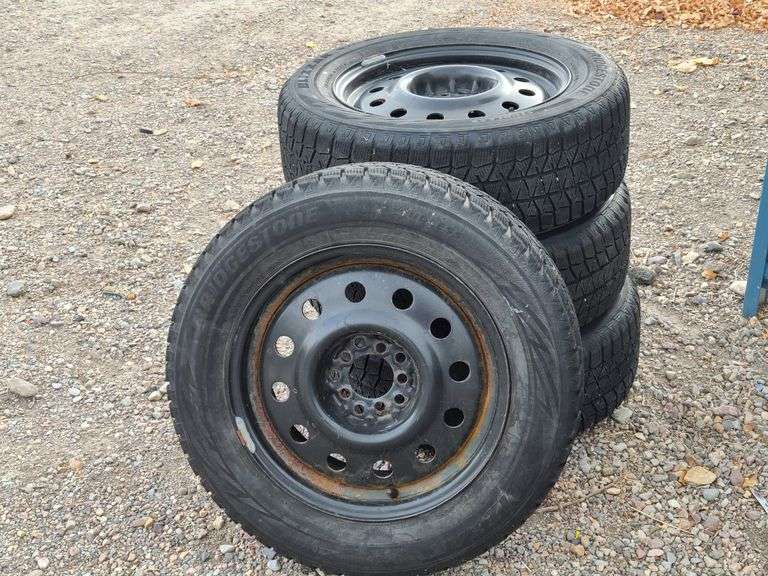4) Bridgstone Tires 215/60R16 with Wheels - Prime Time Auctions, Inc.