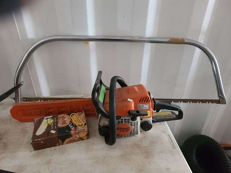 Stihl Chainsaw, Two Man Saw and Filing Guide - Prime Time Auctions, Inc.
