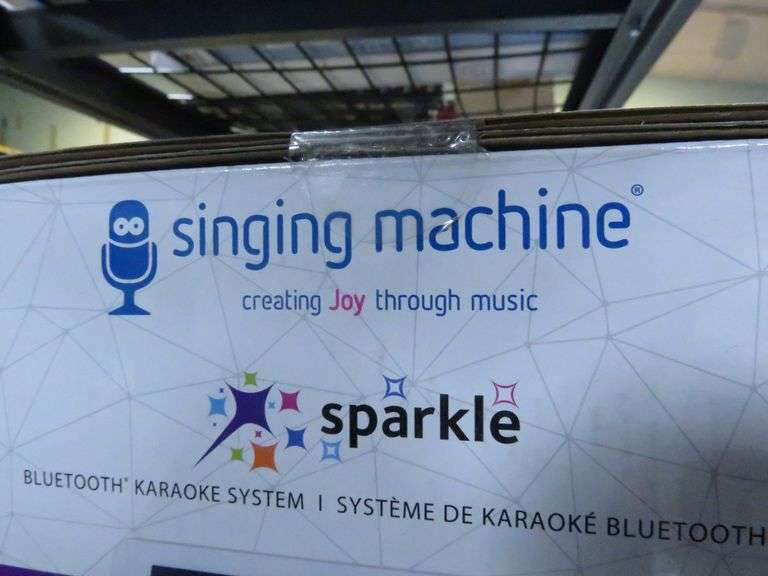 Sparkle Singing Machine - Prime Time Auctions, Inc.