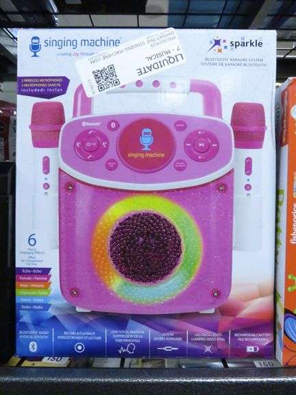 Sparkle Singing Machine - Prime Time Auctions, Inc.