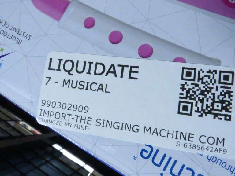 Sparkle Singing Machine - Prime Time Auctions, Inc.