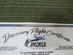 Discovery Flight Certificate - Prime Time Auctions, Inc.