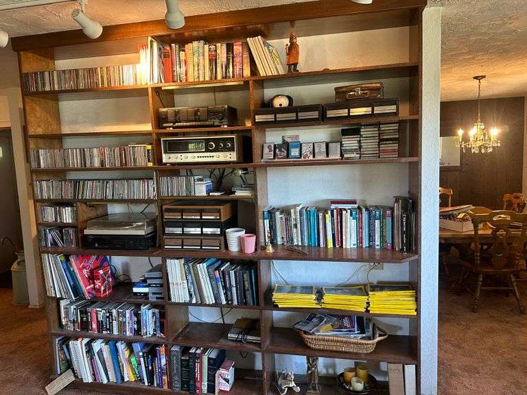 Contents of Wall: CD's, Tapes, Records, Books, National Geographics ...