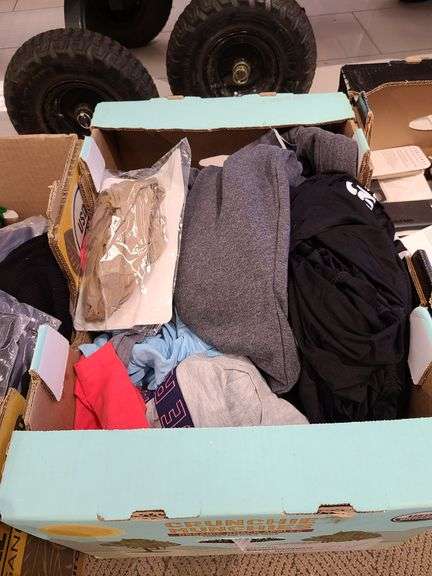 Contents of Box: Clothes - Prime Time Auctions, Inc.
