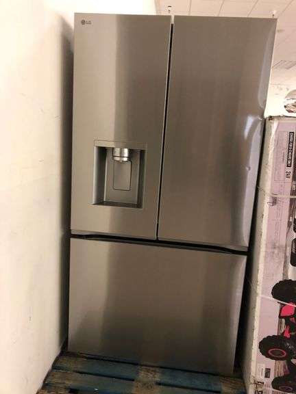 *LG Refrigerator/Freezer - Prime Time Auctions, Inc.