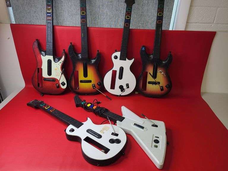 6) 'Guitar Hero' Guitars - Prime Time Auctions, Inc.