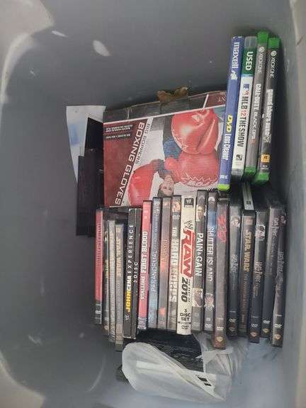 Tote with DVD's - Prime Time Auctions, Inc.