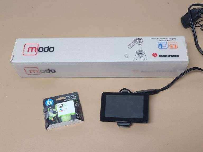 Modo Tripod, Garmin GPS with Plug, HP Color Cartridge - Prime Time ...