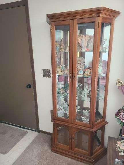 * Curio Cabinet - Prime Time Auctions, Inc.