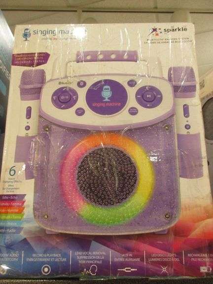 Sparkle Singing Machine - Prime Time Auctions, Inc.