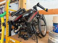 1) StowAway Adventurer Folding Bike** - Prime Time Auctions, Inc.