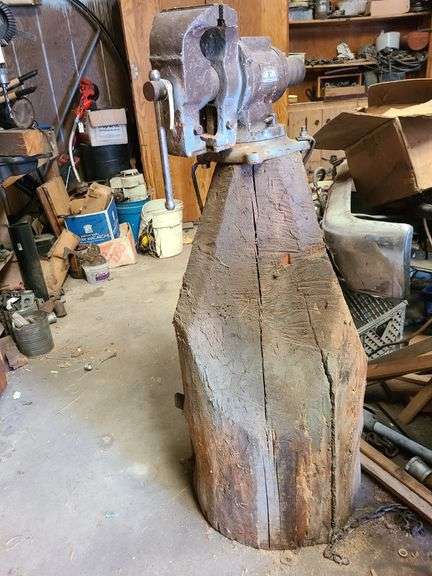 Olympia 5" Multi-Purpose Vise Attached to Log - Prime Time Auctions, Inc.