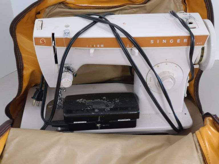 Singer Sewing Machine in Zippered Tote - Prime Time Auctions, Inc.