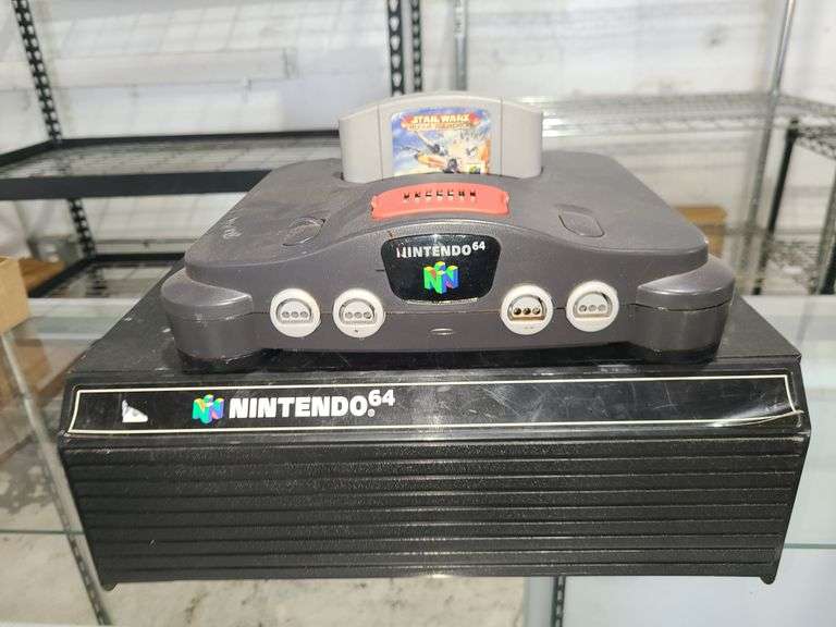 Nintendo 64 and Nintendo 64 Game Holder - Prime Time Auctions, Inc.