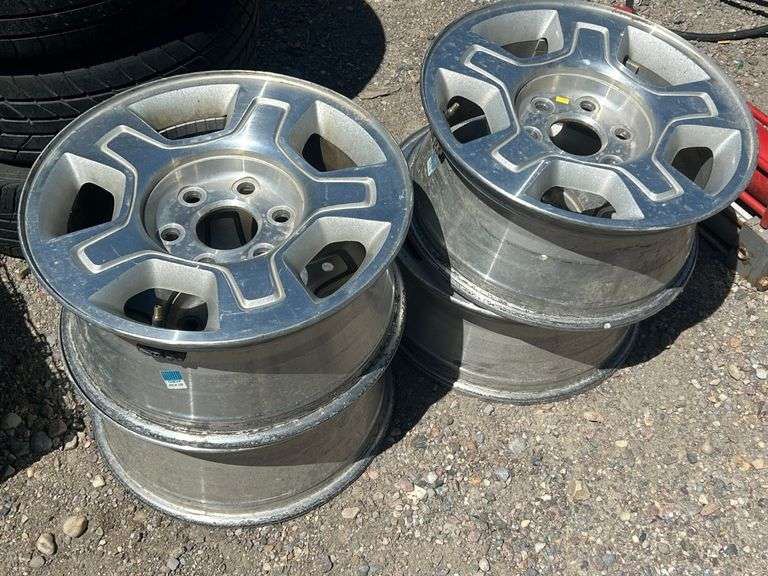 4) Chevrolet Wheels - Prime Time Auctions, Inc.