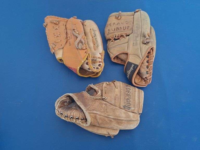 3) Baseball Mitts - Prime Time Auctions, Inc.