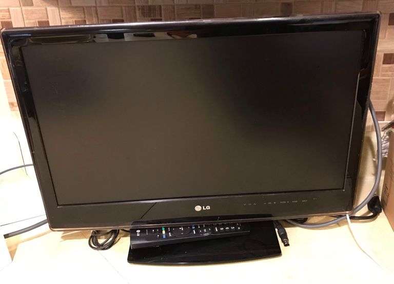 LG - 21 Inch Flat Screen TV - Creamer Auction