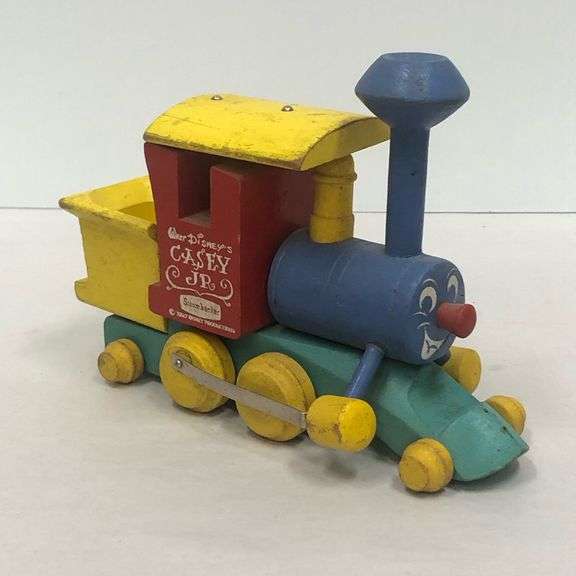 Walt Disney Casey Jr. Pull Steam Engine Toy - Creamer Auction