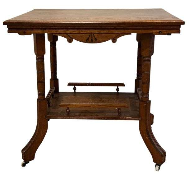 Antique Wooden Parlor Table with Shelf and Casters - Creamer Auction