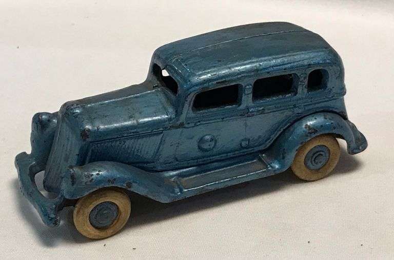 Cast Iron - Four Door Take-A-Part Toy Car - Creamer Auction
