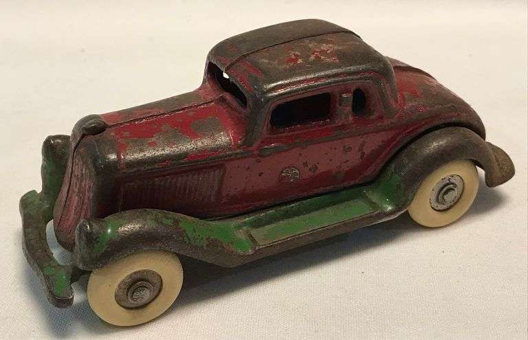 Cast Iron Take-A-Part Two Door Car - Creamer Auction