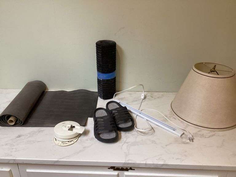 LAUNDRY BASKET WITH VARIOUS HOUSEHOLD ITEMS - Currie Auction Service