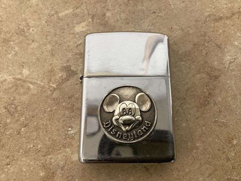 VINTAGE 1968 ZIPPO LIGHTER W/DISNEYLAND BADGE - Currie Auction Service