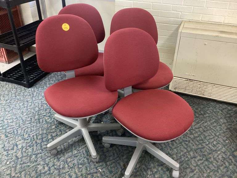 4 RED OFFICE CHAIRS - Currie Auction Service