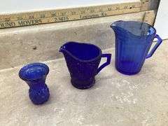 2 SMALL COBALT BLUE PITCHERS AND TOOTHPICK HOLDER - Currie Auction Service