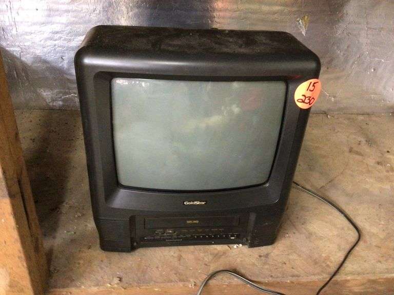 GOLDSTAR TV WITH VCR - Currie Auction Service