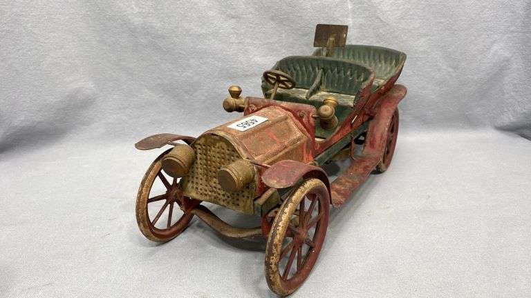 Antique wind up hill climber toy car - Dixon's Auction at Crumpton