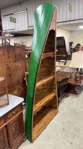 Repurposed canoe bookshelf - Dixon's Auction at Crumpton