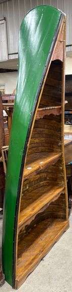 Repurposed canoe bookshelf - Dixon's Auction at Crumpton