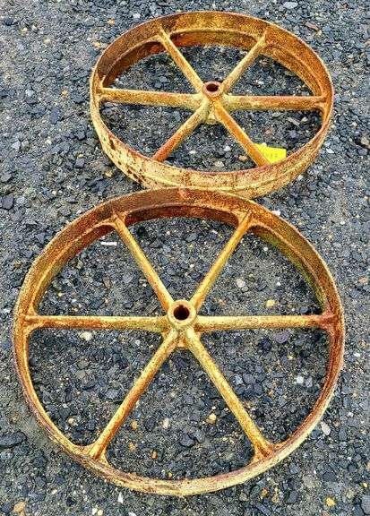 Pair Of Antique Cast Iron Wheels - Dixon's Auction at Crumpton