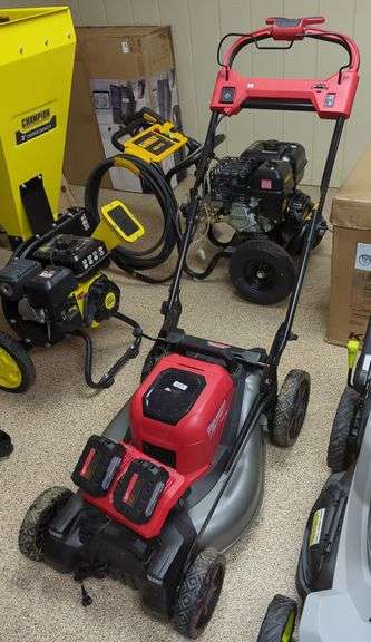 Milwaukee Fuel M18 Battery Powered Push Mower with Charger and Two ...