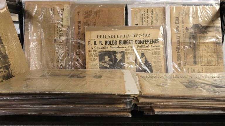 Collection of Antique Newspapers in Plastic - Dixon's Auction at Crumpton