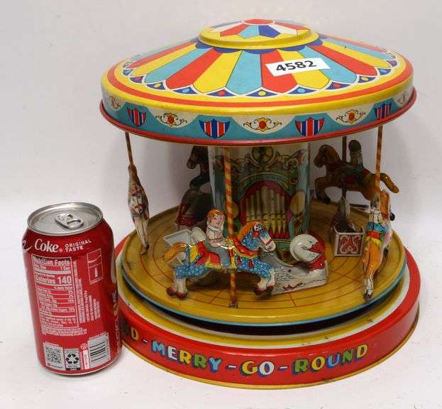 Vintage J. Chein Wind Up Tin Carousel Toy - Dixon's Auction at Crumpton