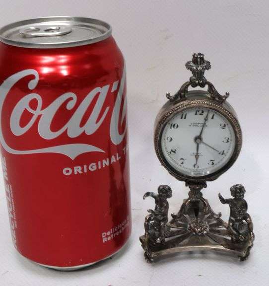Looping Continental Silver 8 Day Clock - Dixon's Auction at Crumpton