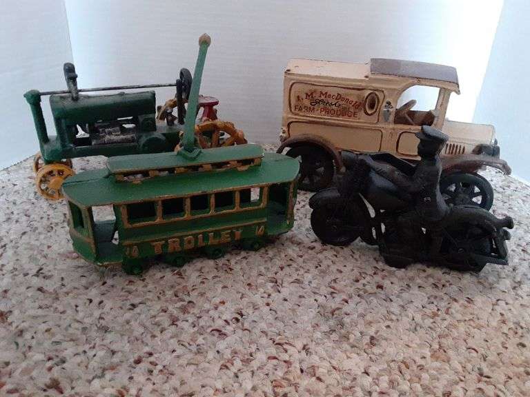 (4) Cast Iron Reproduction Toys - Delaware Auction Center
